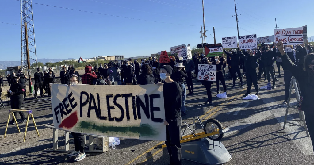 People Block Raytheon Entrance To Protest 'Genocide Economy ...